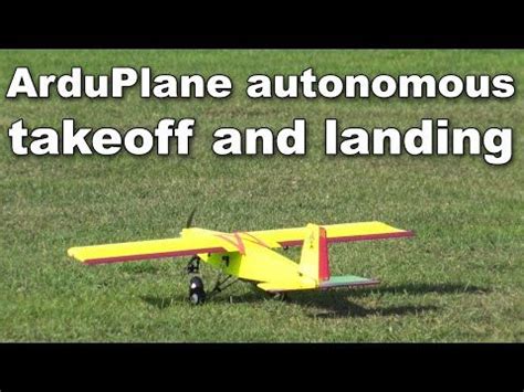 A Small Yellow Airplane Sitting On Top Of A Lush Green Field With Text Overlaying It