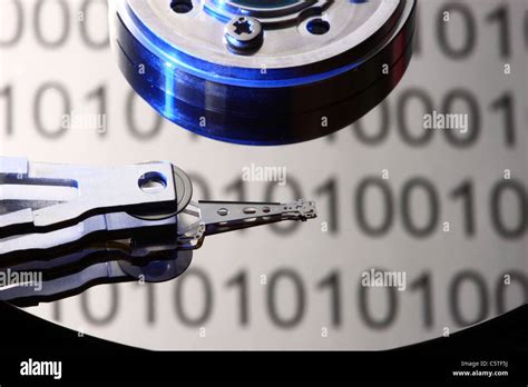 Computer Hard Drive Opened Writing Reading Head And Hard Disk Binary Code Numbers Are