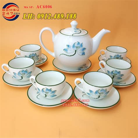Bộ ấm chén men kem dáng minh long vẽ sen xanh