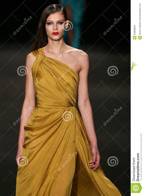 A Model Walks The Runway At The Monique Lhuillier Fashion Show During