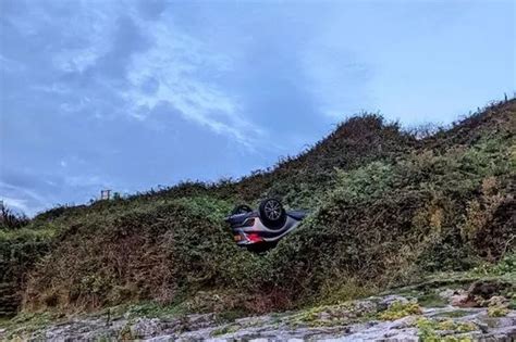 Car Ends Up Upside Down After Rolling Off Cliff At Beachside Car Park