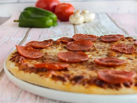 Premium Photo Pepperoni Pizza Closeup Topping With Capsicum Mushroom