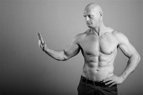 Premium Photo Portrait Of Shirtless Man Against White Background