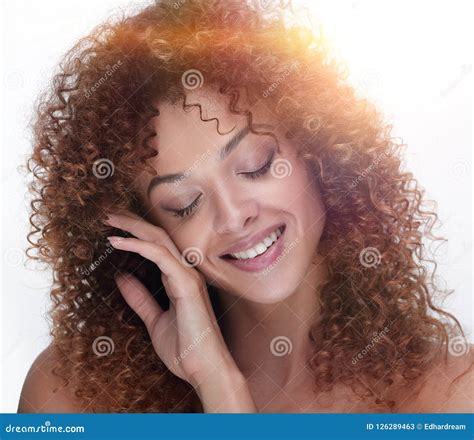 Close Up Portrait Of A Beautiful Young Woman With Wavy Hair Stock