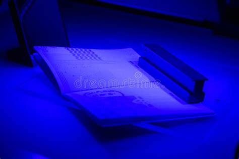Checking The Passport For Fraud In Uv And Another Light Detection Of Luminescence Of Protective