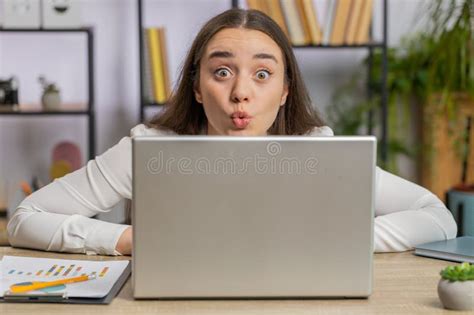 Office Businesswoman Hiding Behind Laptop Computer Making Funny Silly