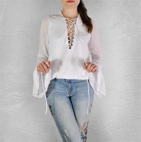 Blooming Jelly Sheer Front Lace Up Bell Sleeve Plunge Deep V Neck Top