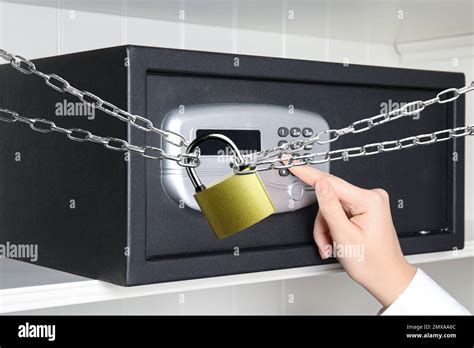 Woman Opening Steel Safe With Electronic Lock Closeup Stock Photo Alamy