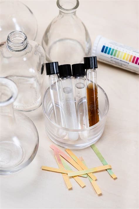 Test Tubes With Various Solutions Bottles On Desk Stock Image Image