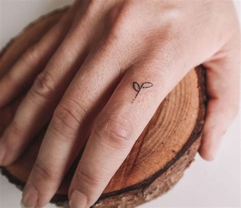 29 Pretty Finger Tattoo Design Ideas From Minimalist To Maximalist