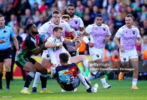 Northampton Saints Dan Biggar Is Tackled By Harlequins Nick David