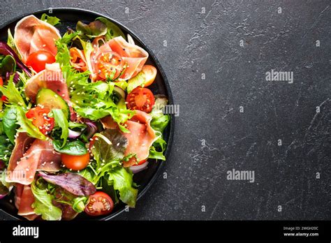 Green Vegetable Salad With Snoked Ham And Sesame Top View With Space