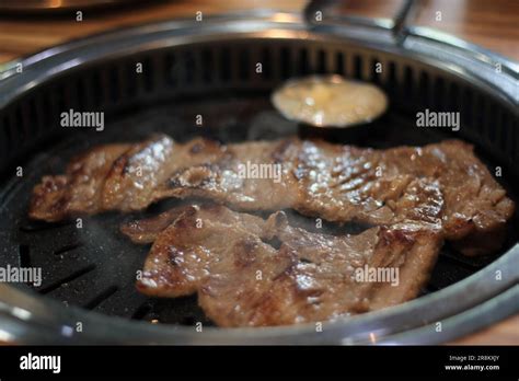 Korean Pork Ribs And Beef Marbled Korean Bbq Style Charcoal Grill Stock