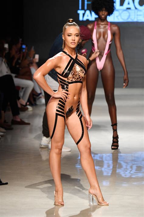 Models Shock In Bikinis Made With Strips Of Black Tape