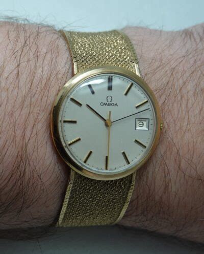 SOLD 1978 Omega 9k Gold Integrated Bracelet Birth Year Watches