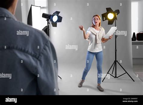 Emotional Woman With Script Performing In Front Of Casting Director