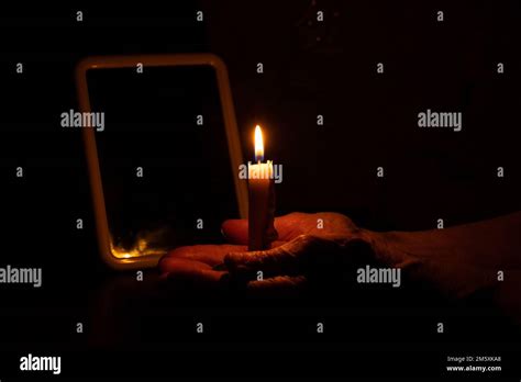 Old Womans Hands And Candle Flame In The Dark Candle Light Mourning