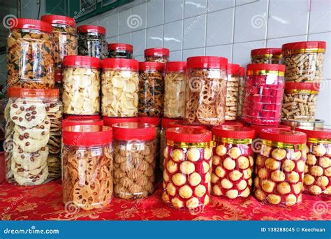 Assorted Chinese New Year Cookies And Biscuits In Plastic Jar Stock
