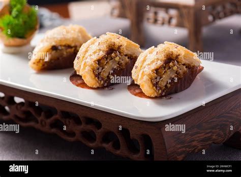 A Plate Of Traditional Sichuan Snacks Brown Sugar Glutinous Rice Cake