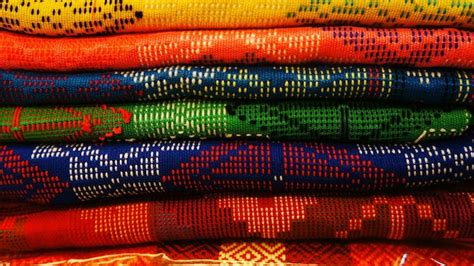 Premium Photo Close Up Of Colorful Fabrics Stack