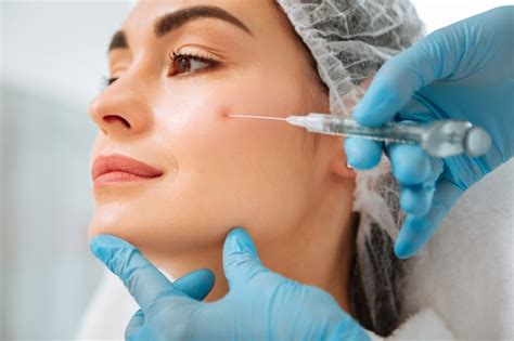 Premium Photo Close Up Of A Female Cheek During The Beauty Injection