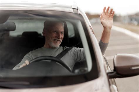 Premium Photo Senior Man Smiling At Toothy Smile Greeting Waving With