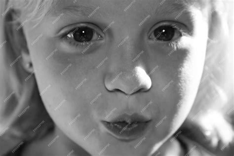 Premium Photo Close Up Portrait Of Cute Girl Puckering