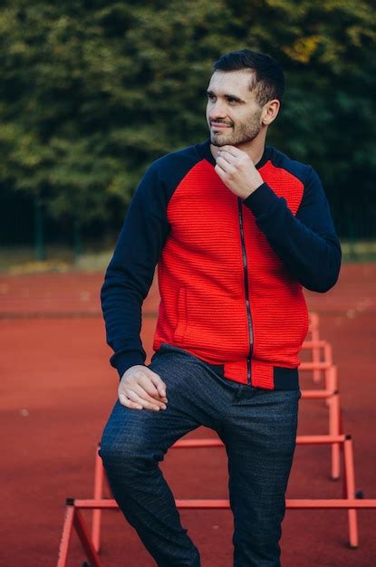 Premium Photo A Portrait Of A Man In A Red Jacket