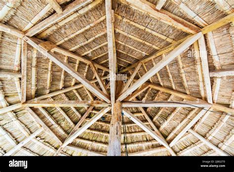 Underside Of A Wooden Beach Side Hut Made With Nipa Palm Roofing In