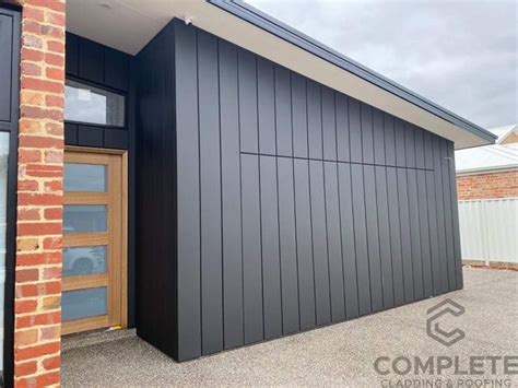 Seamless Vertical Cladding Garage Door In 2024 Cladding House Remodelling Garage Doors