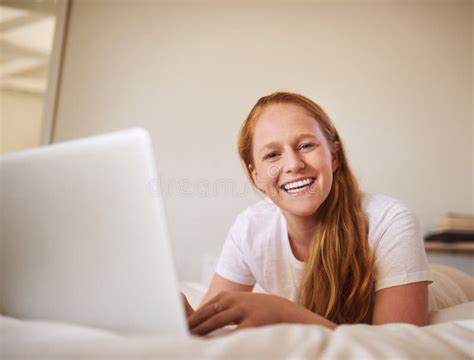 Girl Laptop And Portrait For Networking While On Bed Searching And