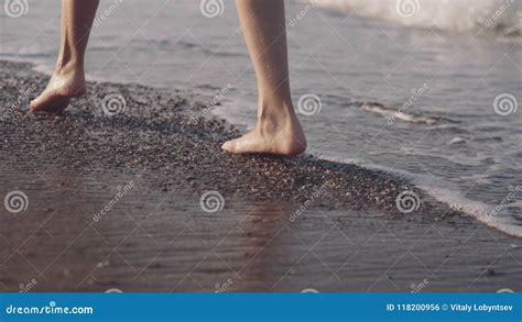 The Girl Walks Barefoot Along The Seashore Stock Footage Video Of