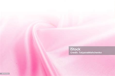 텍스처 배경 패턴입니다 라이트 베이 지 핑크 음영을 나타냅니다 실크 직물 텍스트 공간의 핑크 실크 배경 자연 질감에 따라 0명에