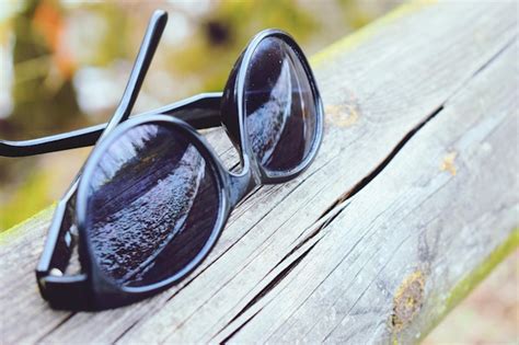 Premium Photo Close Up Of Sunglasses On Table