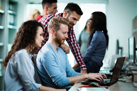 Programmers Cooperating At Information Technology Company Stock Photo Image Of Occupation