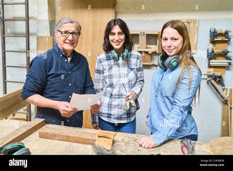 A Diverse Team In A Lumberyard Demonstrates Teamwork And Collaboration