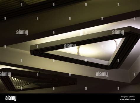 Triangular Lamp In Interior Design Of Lighting Device Lamp On Ceiling