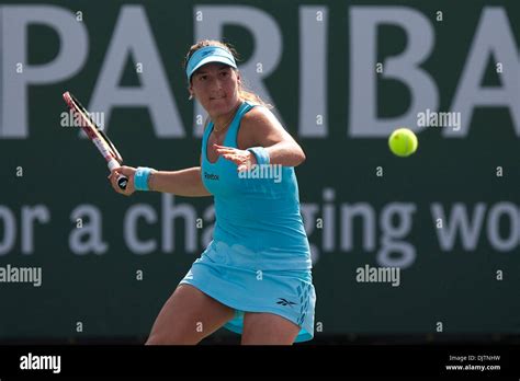 Flavia PENNETTA ITA Yellow Shirt And Shahar PEER ISR Light Blue
