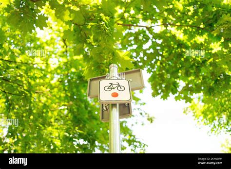 Bike Path Sign In City Park Alerting Pedestrians About The Movement Of