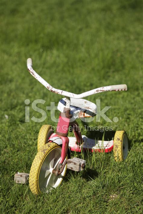 세 발 자전거에 아기 스톡 사진 Freeimages