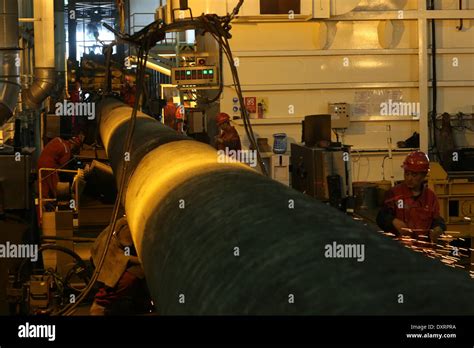 140330 Dar Es Salam March 30 2014 Xinhua Workers Work On Chinas Cpp 601 Pipelaying