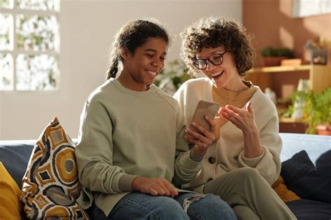 Premium Photo Mom Spending Time With Her Adopted Daughter At Home