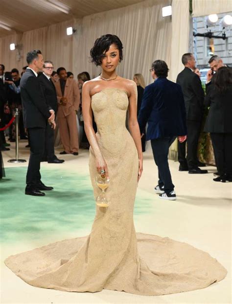 Tyla Has To Be Lifted Up 2024 Met Gala Steps In Sand Dress Parade