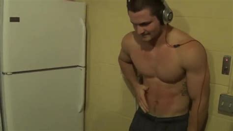 A Hot Guy Havind His Abs Punching