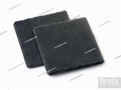 Two Black Square Empty Slate Stone Plates Isolated On White Stock