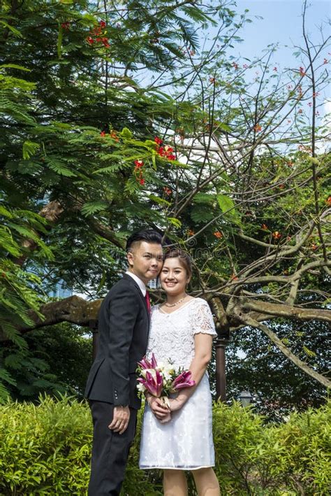 Asian Loving Couple Pre Wedding Outdoor Photo Shoot Casual Natural