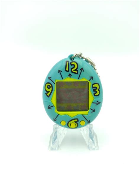 Tamagotchi Original P P Teal W Yellow Bandai Japan Buy Tamagotchis