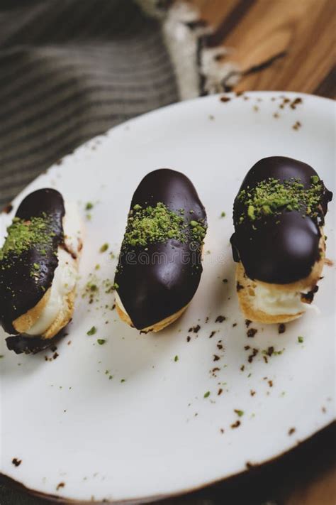 Eclairs With Chocolate Topping Delicious Chocolate Small Cake Ekler