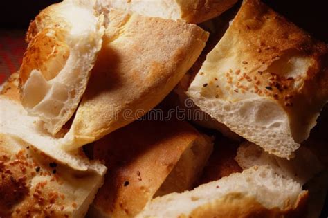 Freshly Baked Bread Pieces With A Crispy Crust And Soft Interior Stock