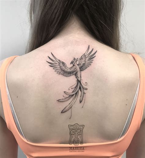Татуировка Птица Феникс на спине Tatuajes